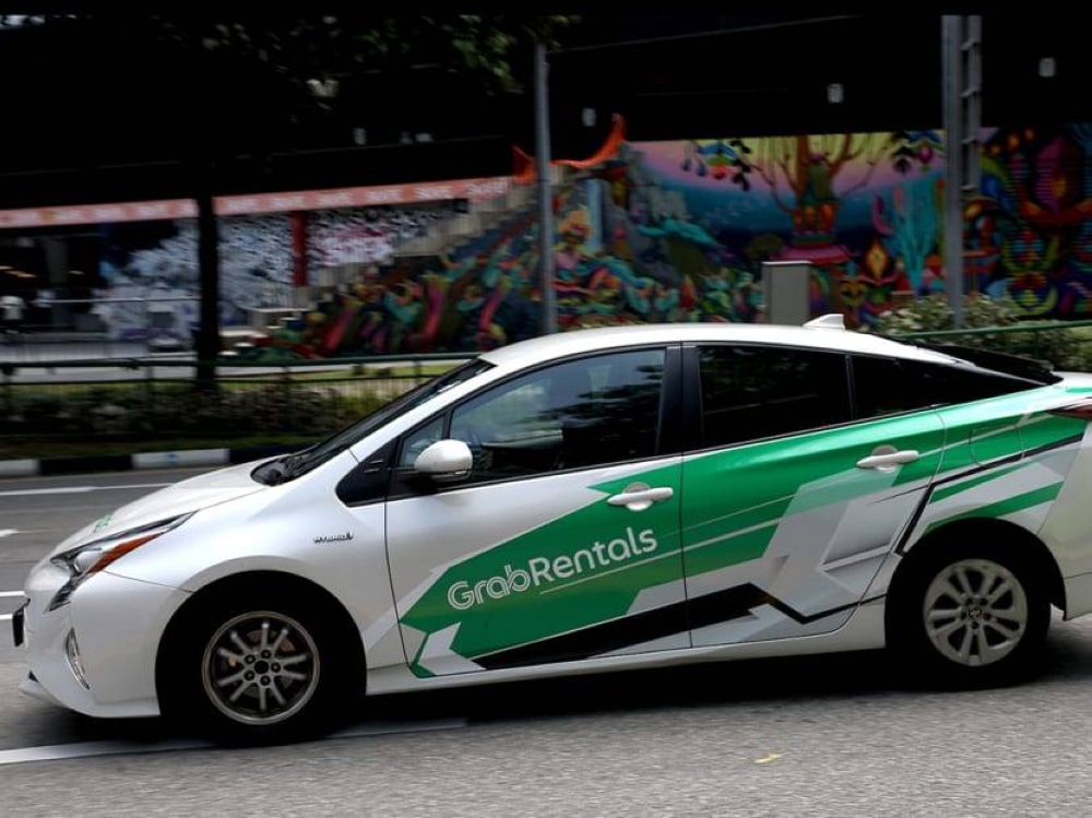 Fares of private-hire cars in Singapore surge as more workers return to ...