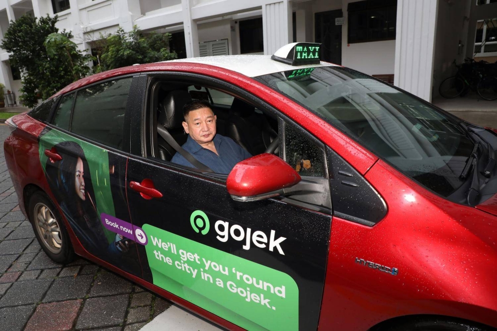 As the sun goes down on the taxi industry in Singapore, some adapt while others risk being left ...