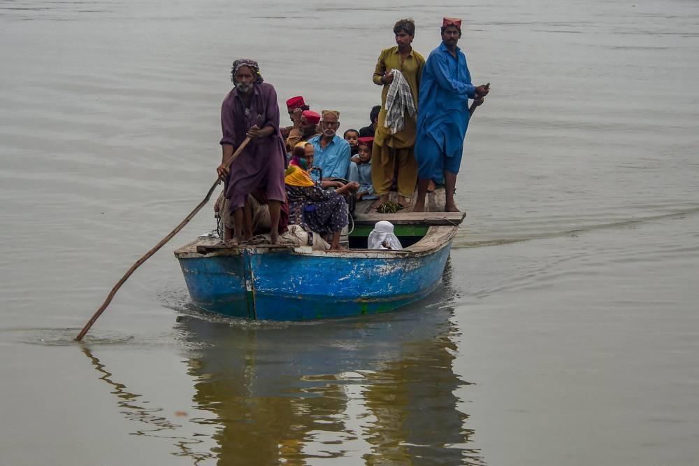Pakistan orders thousands to evacuate near flood-swollen rivers | Malay ...
