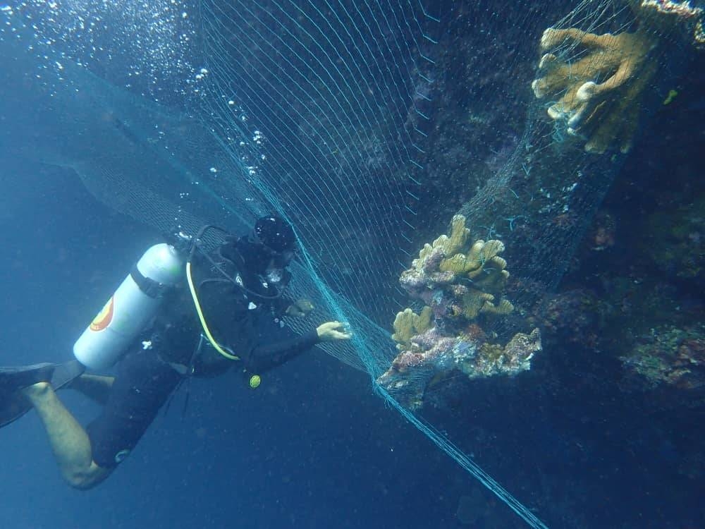 Sipadan island coral reefs damaged by 900m tangled fishing net, boat ...