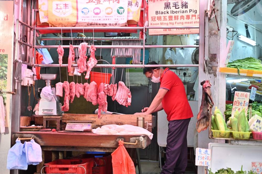 China dips into pork reserves as rising prices fan inflation fear ...