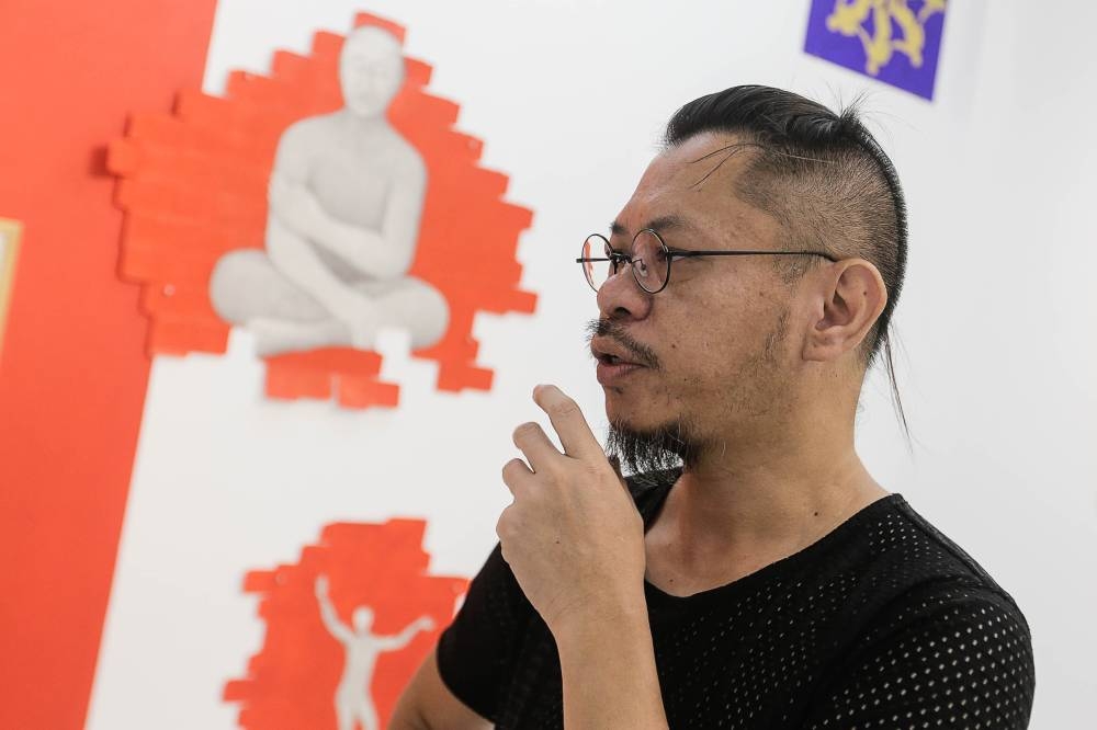 Malaysian artist creates dream-like artwork on unusual materials ...