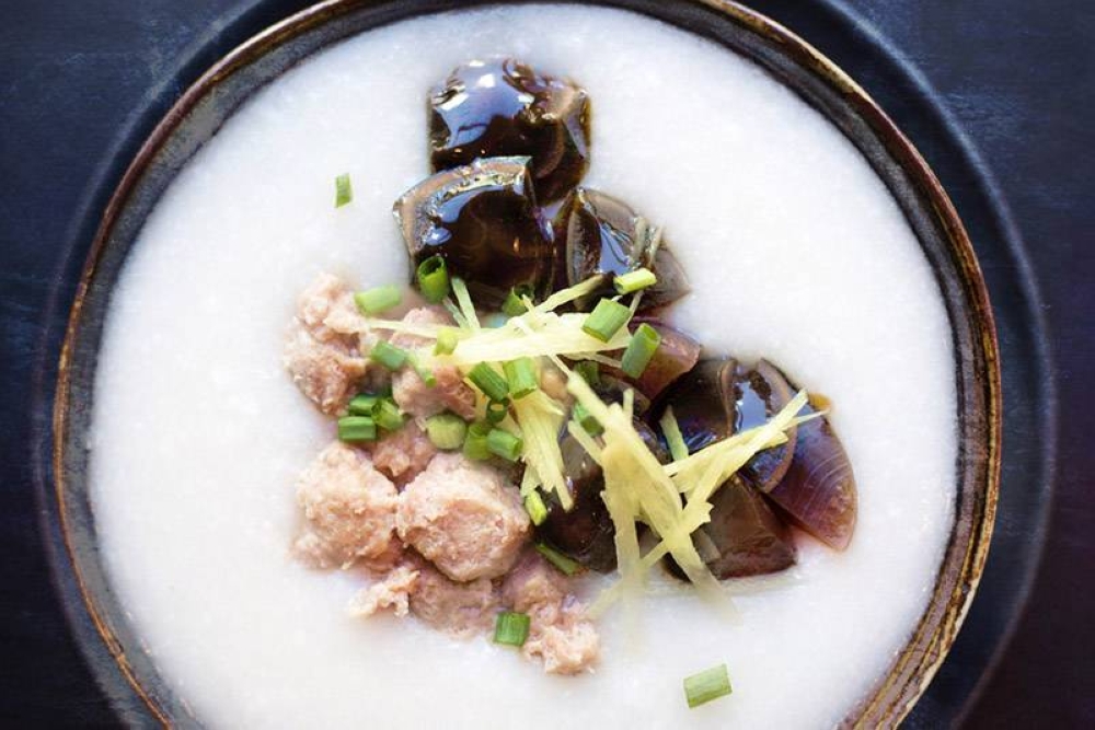 Brimful of umami and love, this pork and century egg congee tastes like ...