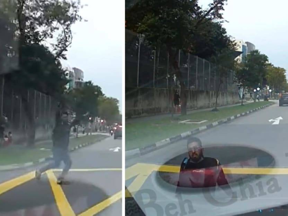 Singapore police probing man seen in viral video running onto car’s ...