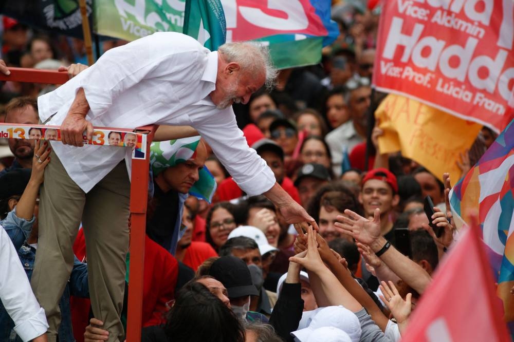 Bolsonaro, Lula go on attack ahead of Brazil runoff | Malay Mail