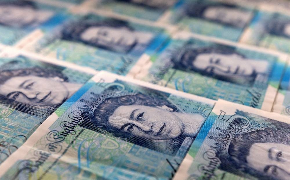 Stocks, sterling extend gains after UK budget U-turn | Malay Mail