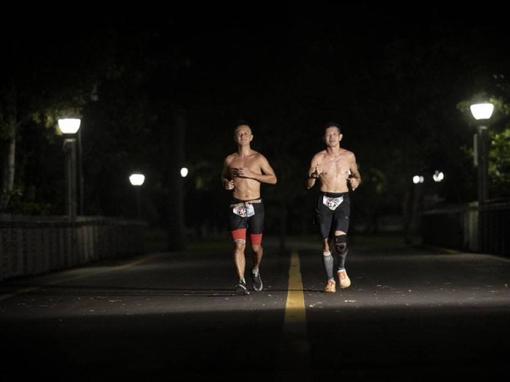 Two Singaporeans run over 300km each, smashing national record in ...