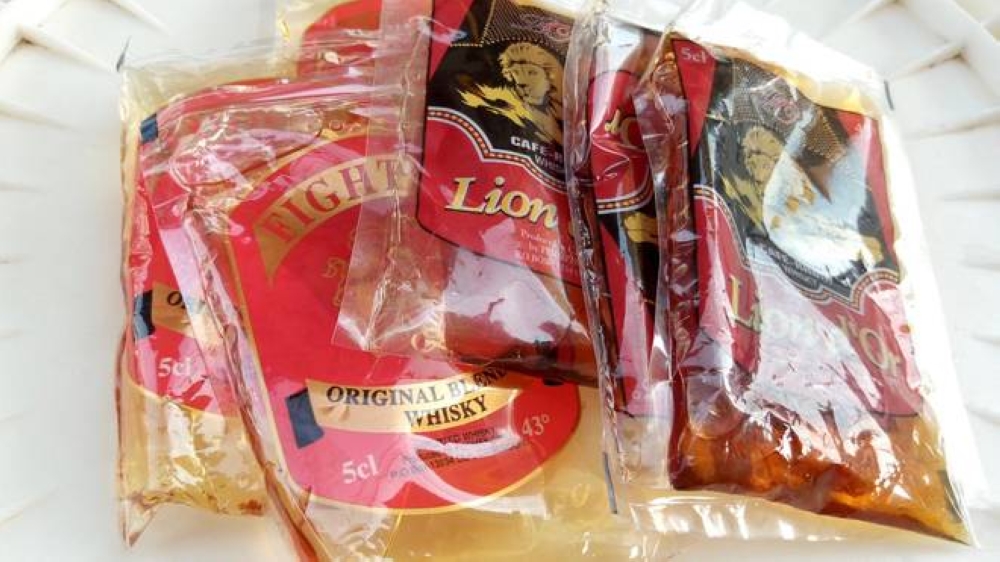 Cameroon to finally call time on 'sachet whisky' drinking | Malay Mail