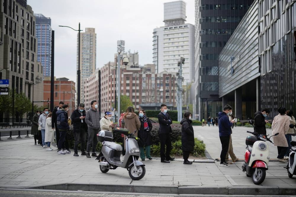 China prepares for 'life again' as lockdowns lift across country ...