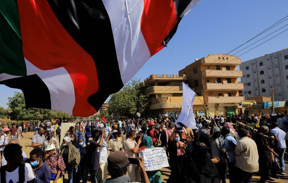 Sudan protesters face tear gas, stun grenades on uprising anniversary ...