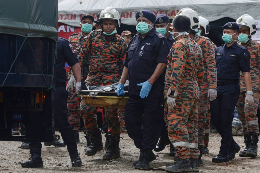 Batang Kali landslide: Four more bodies found as death toll rises to 30 ...