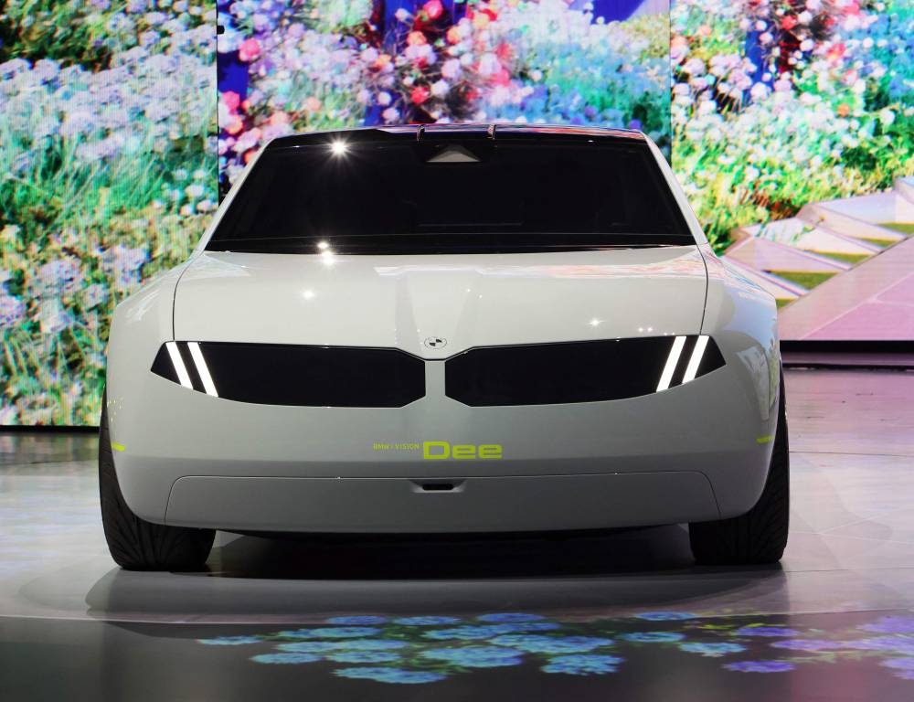 ‘Terminator’ Schwarzenegger on hand as BMW unveils car that can change ...