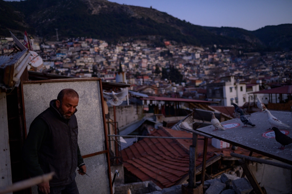 Bird man in Turkey vows to tend to flock after quake | Malay Mail