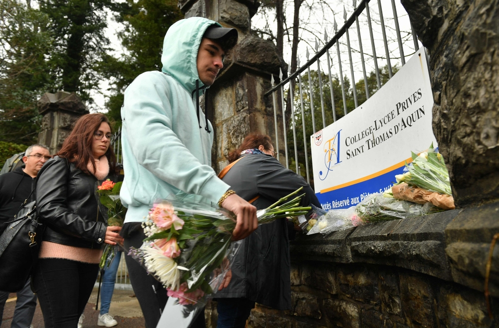 Lawyer: French teenager charged with murder over teacher killing ...