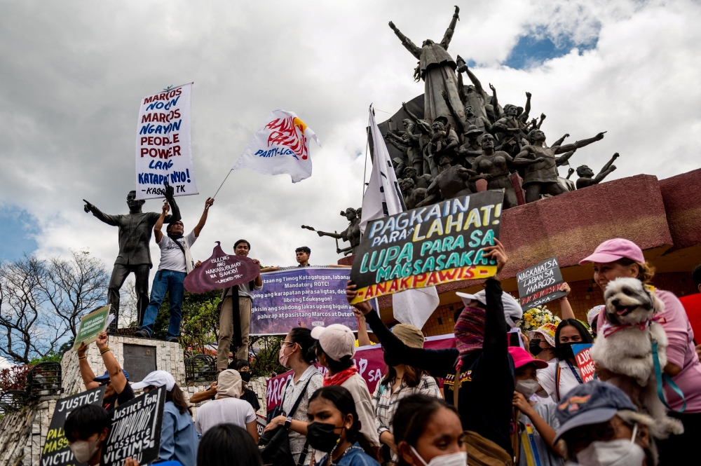 Marcos seeks unity as Philippines marks ‘people power’ anniversary ...