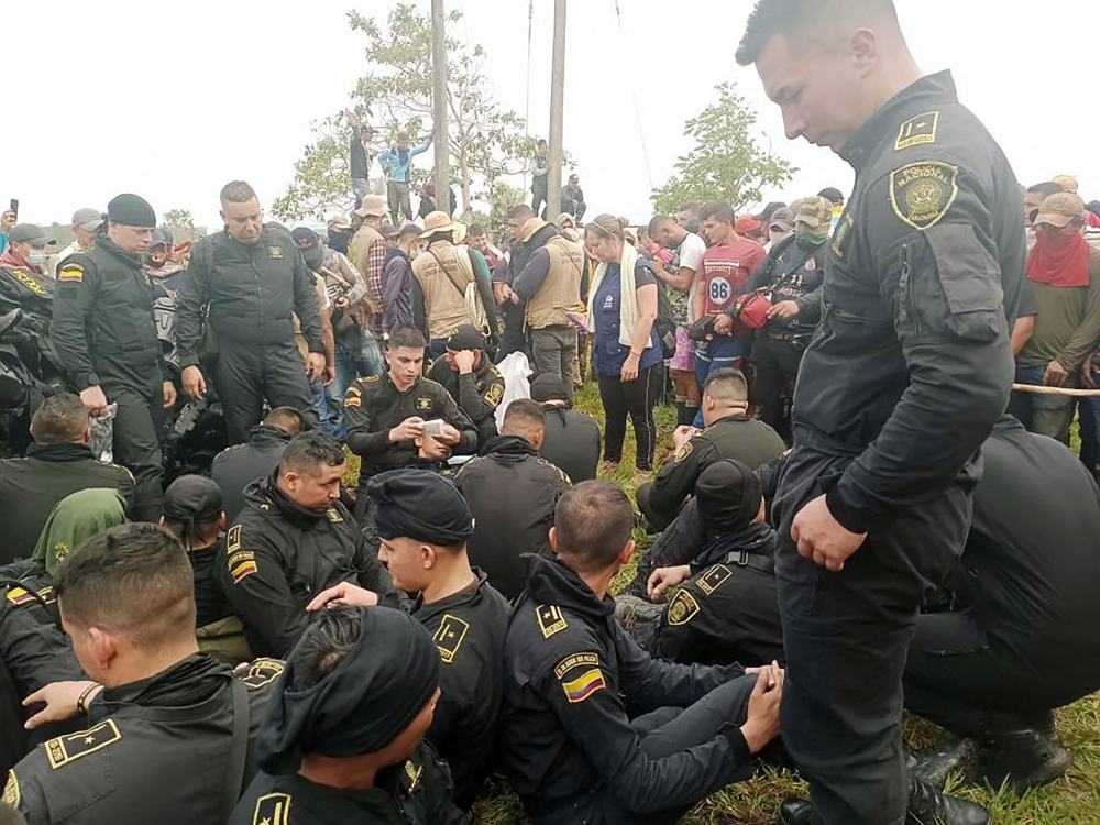 Two dead, dozens of police held hostage in Colombia in protest against ...