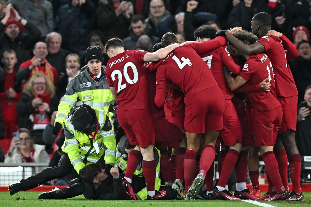 Liverpool to ban pitch invader who nearly injured Robertson | Malay Mail