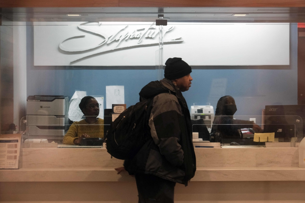 US regulator sells failed Signature Bank assets to another lender ...