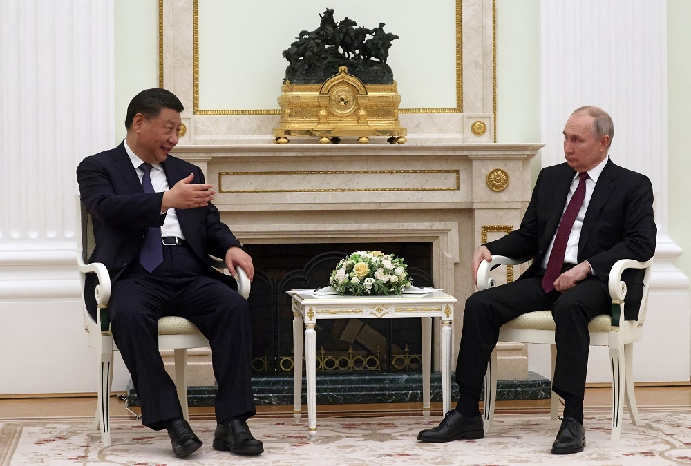 Putin flaunts alliance with Xi as ‘dear friends’ meet in Kremlin ...