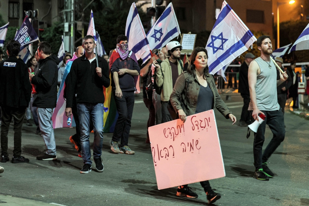 Netanyahu vows unity as Israelis mass against justice reforms | Malay Mail