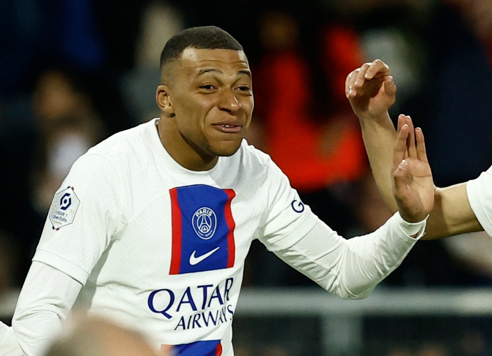 PSG close in on title as Mbappe double sinks Angers | Malay Mail