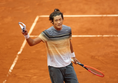 Zhang makes history for China by reaching Madrid last eight | Malay Mail