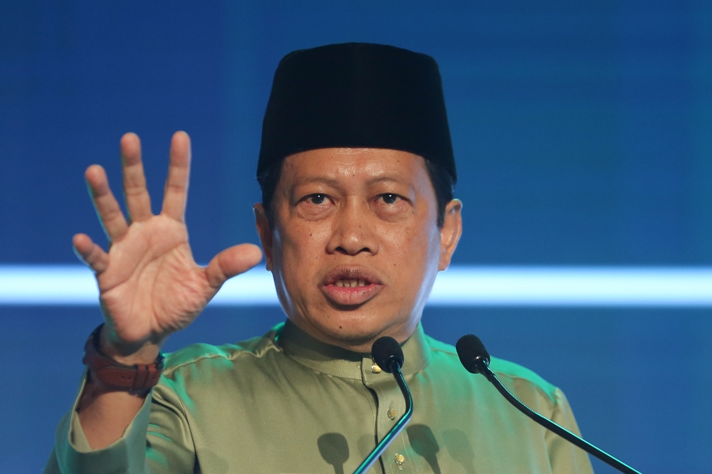 State polls: No Umno, DAP logo on ballot papers, says Ahmad Maslan ...
