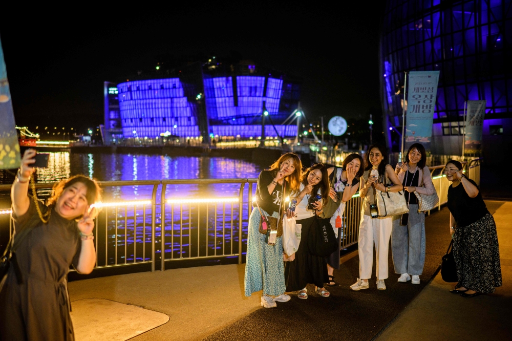 Seoul hosts large crowds as BTS fans celebrate 10-year anniversary ...