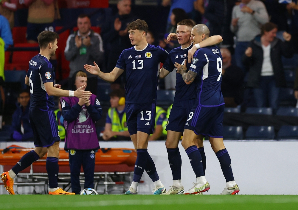 Scotland shrug off rain delay to close in on Euro 2024 | Malay Mail