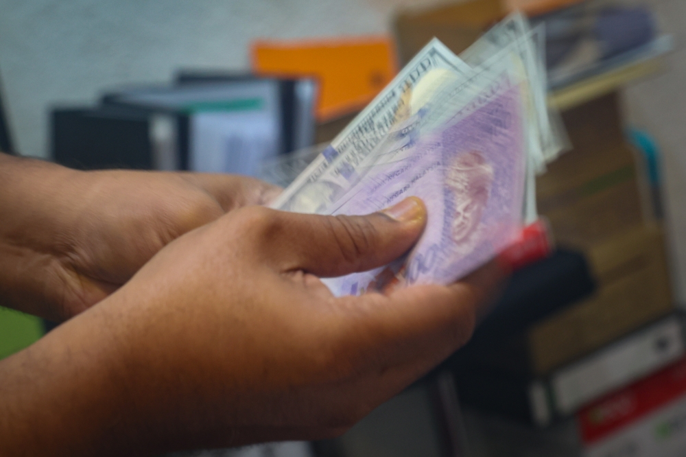 Rating group claims a weak ringgit reflects underlying, entrenched ...