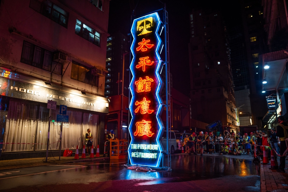 Fading neon signs shine again in Hong Kong exhibit | Malay Mail