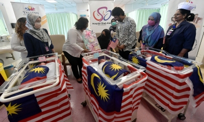 Military couple welcome National Day baby with pride | Malay Mail