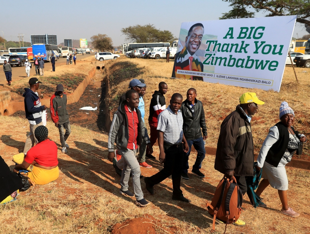 Zimbabwe’s President Mnangagwa sworn in after disputed poll | Malay Mail