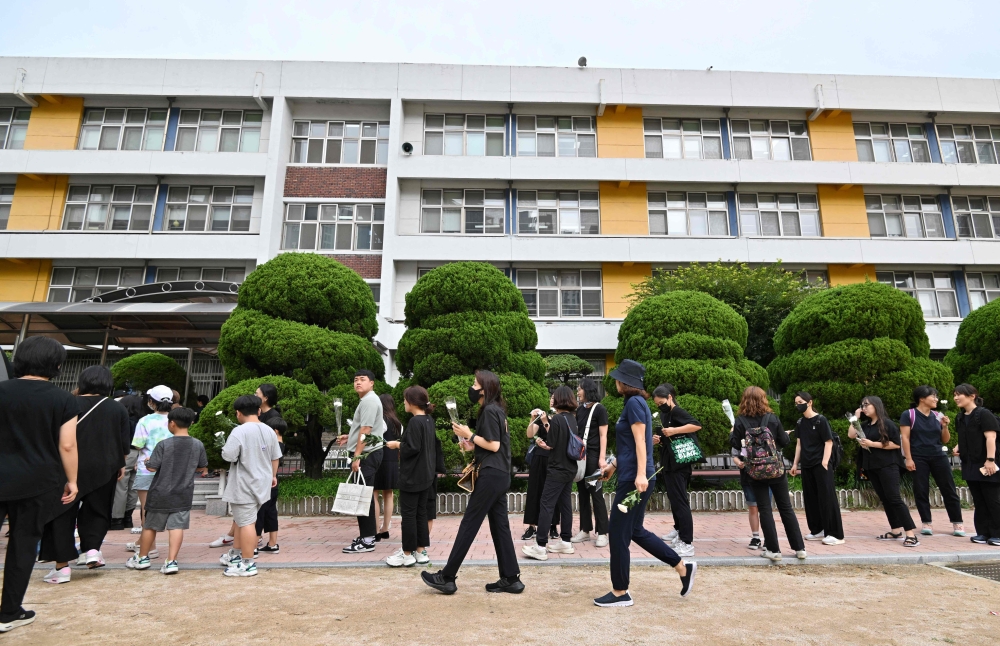 Teacher’s death prompts soul searching in education-obsessed S. Korea | Malay Mail