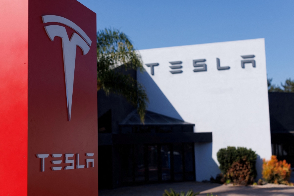 Tesla joins GM, Ford in slowing EV factory ramp as demand fears spread ...