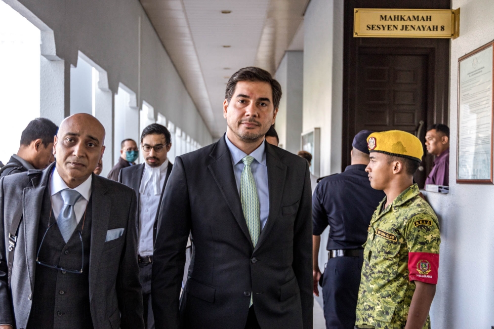 Bersatu’s Adam Radlan pleads not guilty to using RM500,000 of unlawful ...