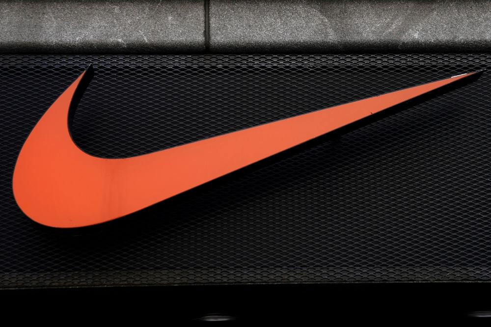 Wall Street rises after soft inflation data; Nike slides | Malay Mail