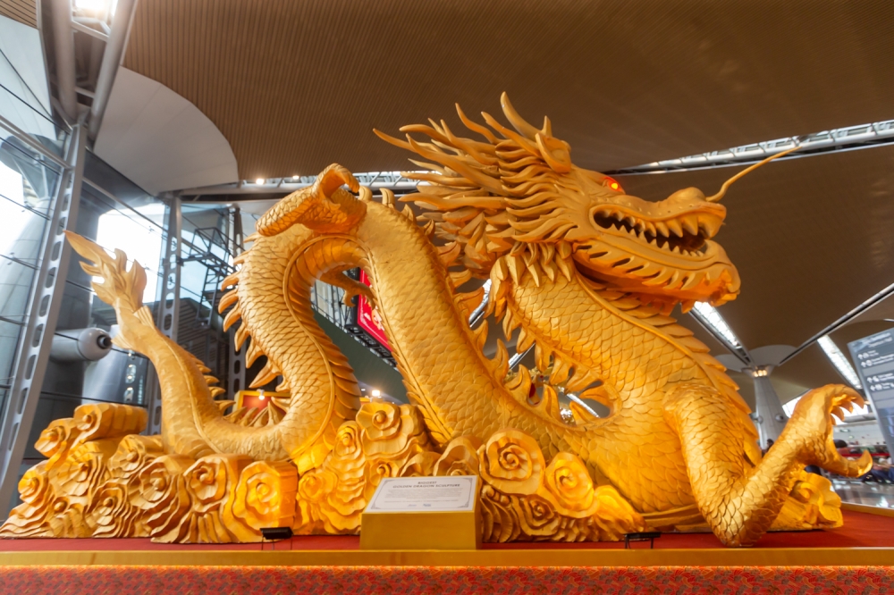 KLIA unveils largest hand-crafted golden dragon sculpture in Malaysia ...