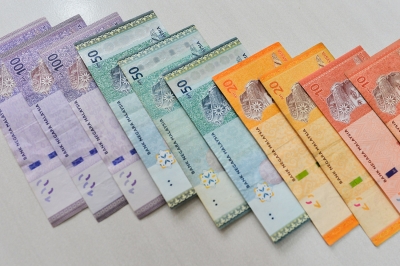 Ringgit opens lower vs US dollar, stronger against other major ...