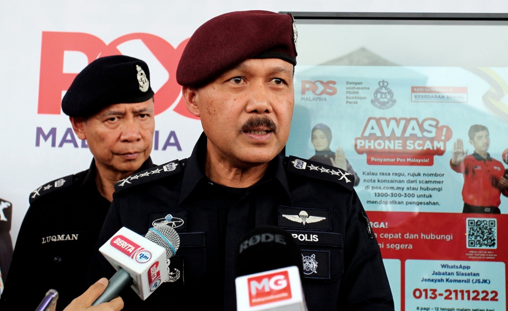 Police, Pos Malaysia join forces to combat online scams, courier ...