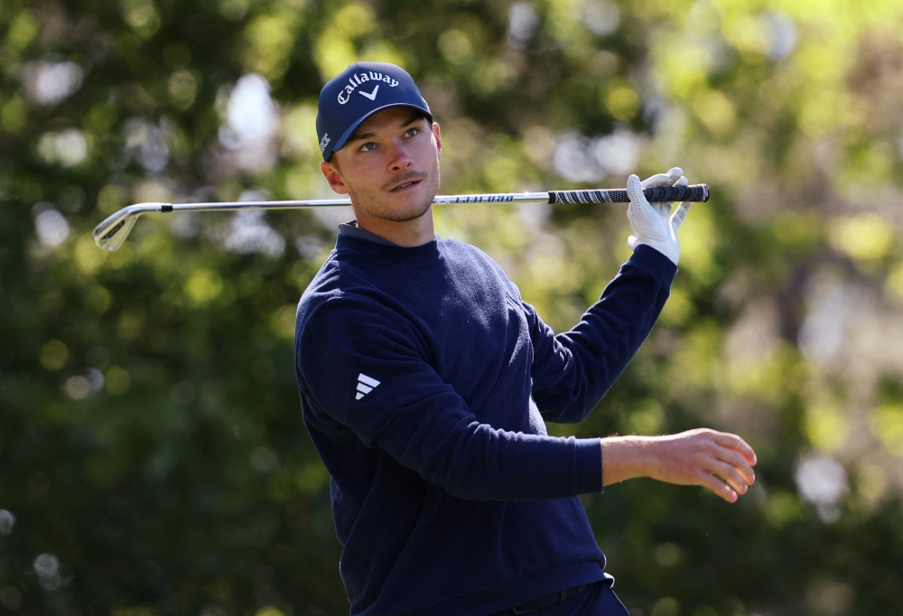 Homa, Hojgaard charge at Masters as Tiger chases history | Malay Mail