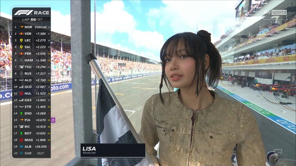 Blackpink's Lisa waves chequered flag at Miami Grand Prix (VIDEO ...