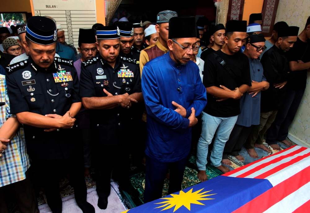 Ulu Tiram attack: Deputy IGP leads funeral honours for fallen cop Constable Ahmad Azza Fahmi in ...