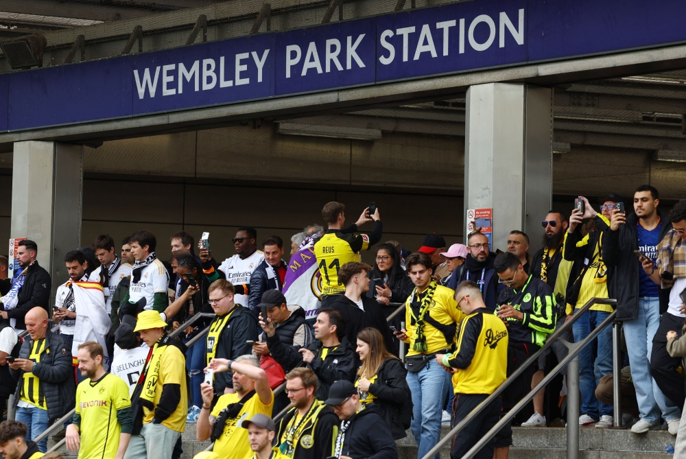 UK police arrest dozens of ticketless fans at Champions League final ...