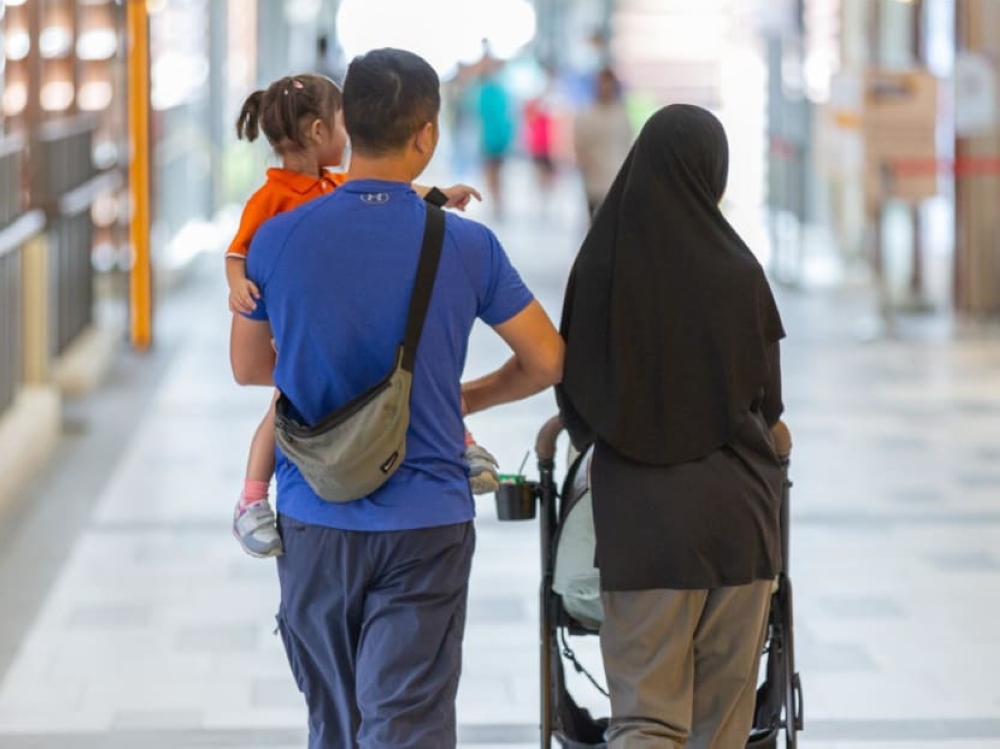 Singapore offers four weeks of mandatory, govt-paid paternity leave; extra 10 weeks of leave to ...