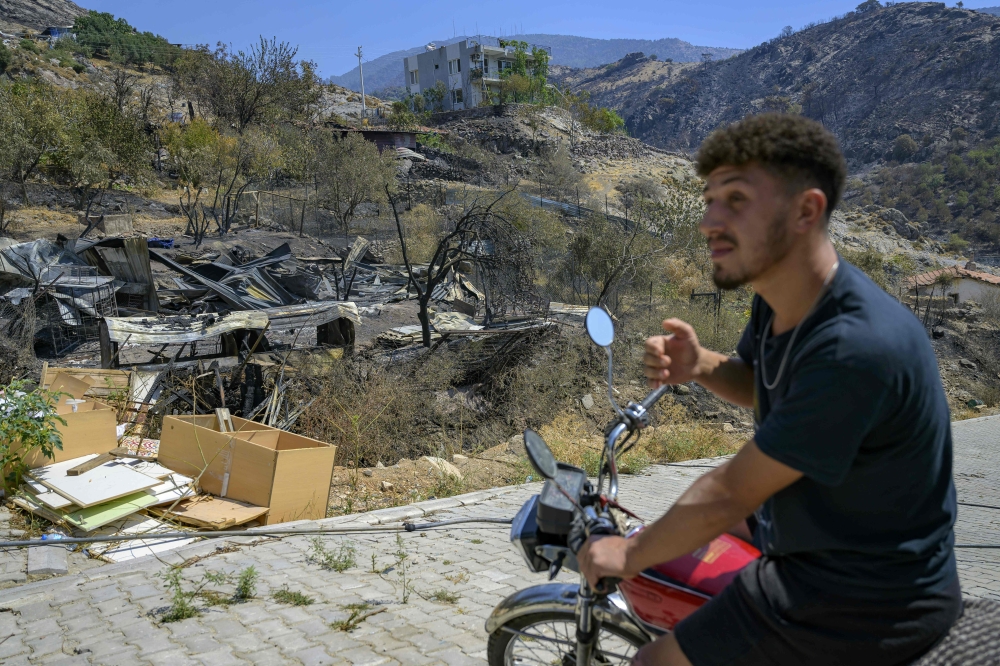 From paradise to hell: Turkish village stunned as forest fires turn ...