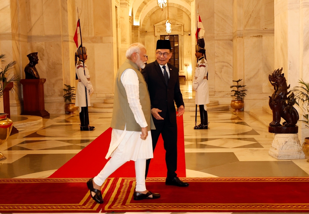 PM Anwar receives ceremonial welcome from Modi at India’s presidential ...