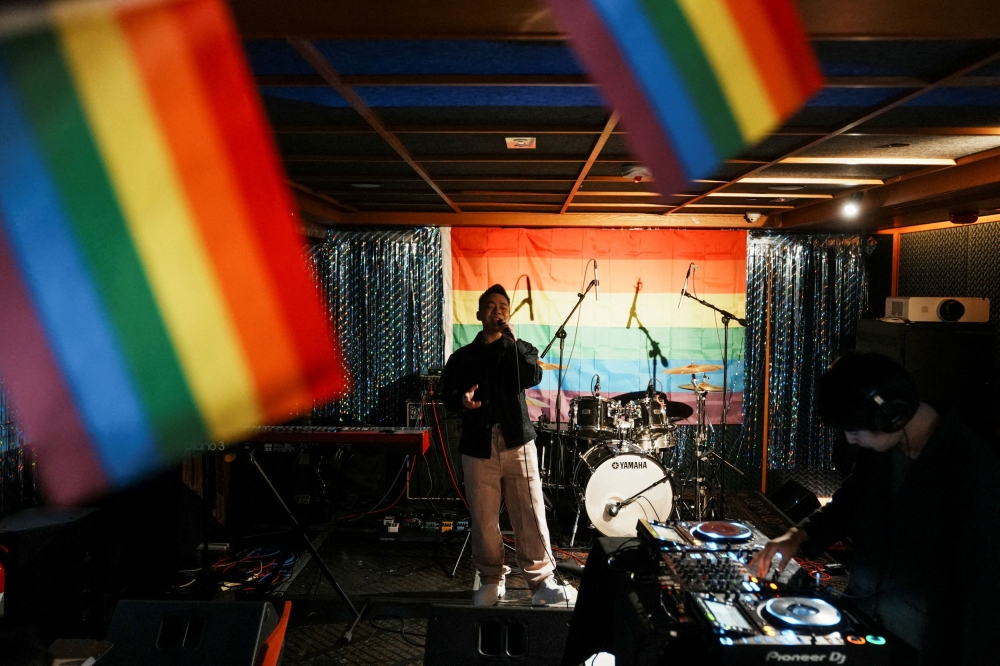 ‘I don’t want to hide’: HK transgender singer SY seeks voice through ...