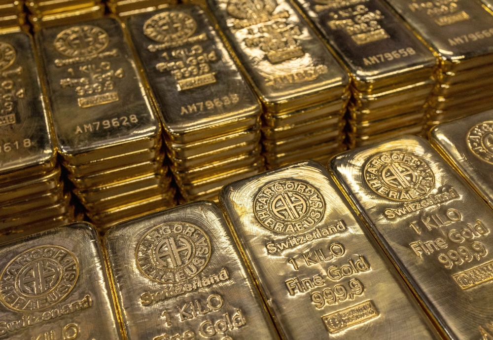 Four men charged with armed robbery of 16.9kg gold bars worth RM5.9m at ...