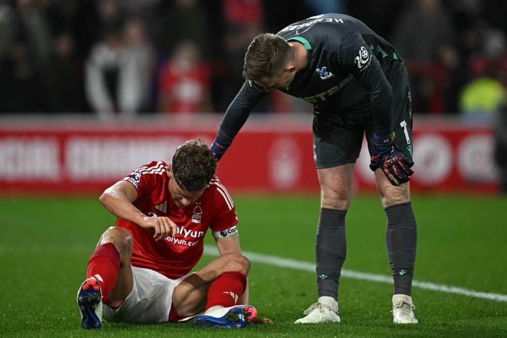 Henderson howler hands Forest victory over Crystal Palace | Malay Mail